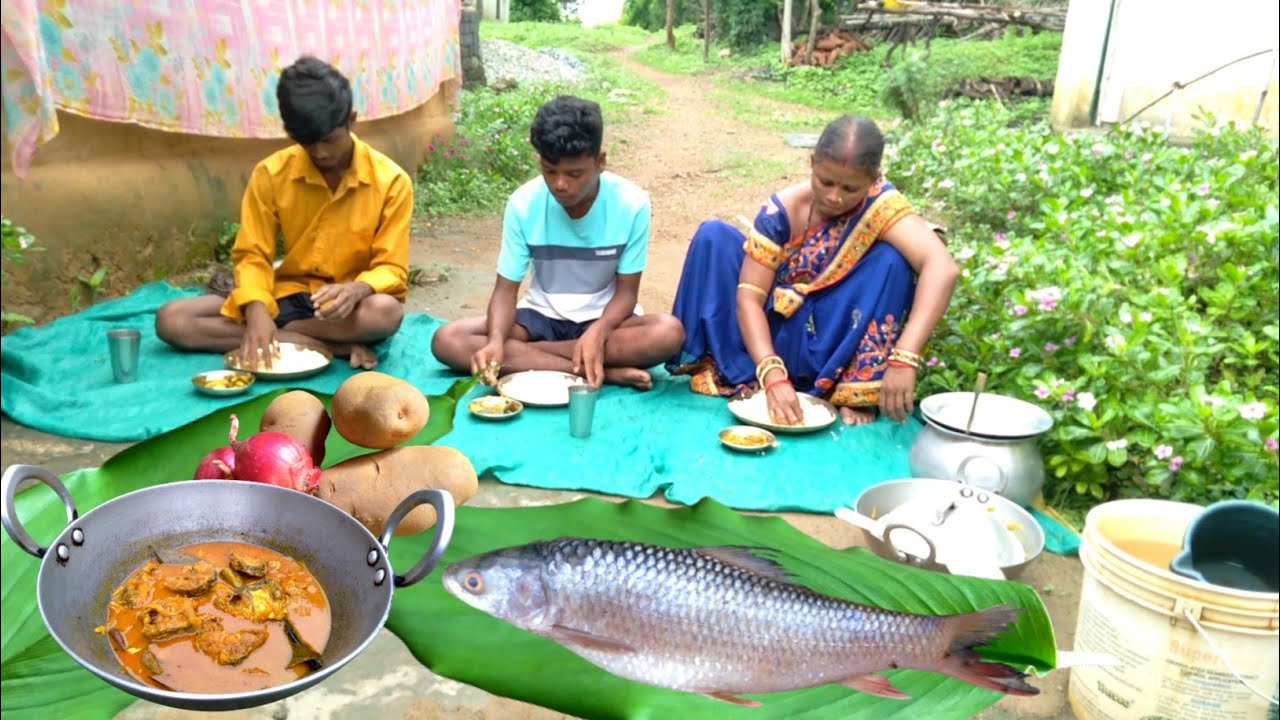 Tribe family cooking fish curry with potato & eating with hot rice l ...