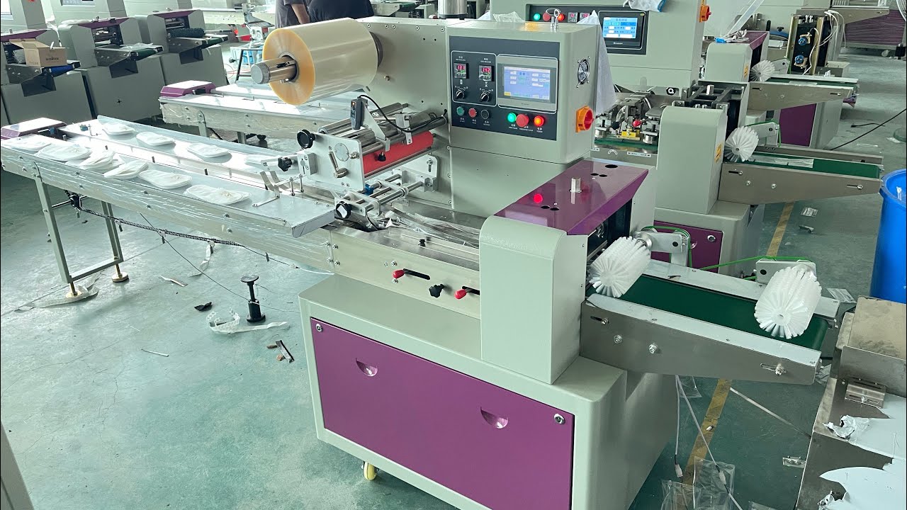 Hotel slippers automatic packing machine - YouTube