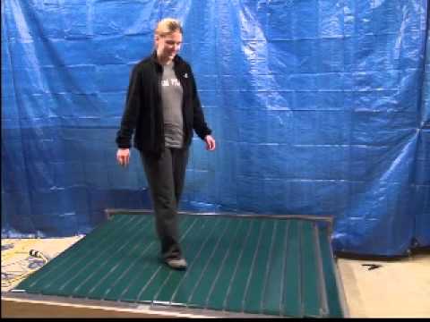 Infinadeck, an omnidirectional treamill - YouTube