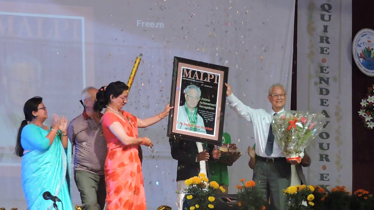 chairman deepak man sherchan being honoured with lifetime achievment ...