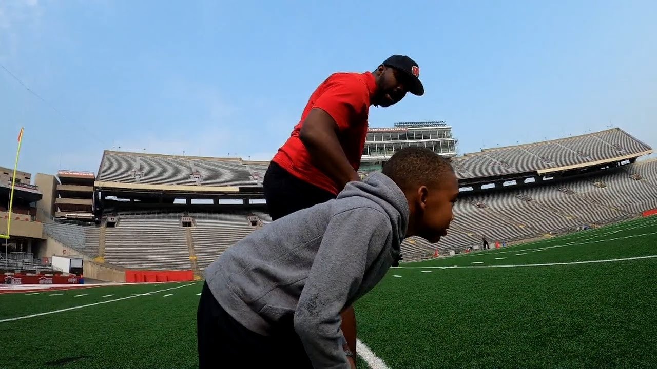 Football and Fatherhood: Wisconsin defensive line coach balances both ...