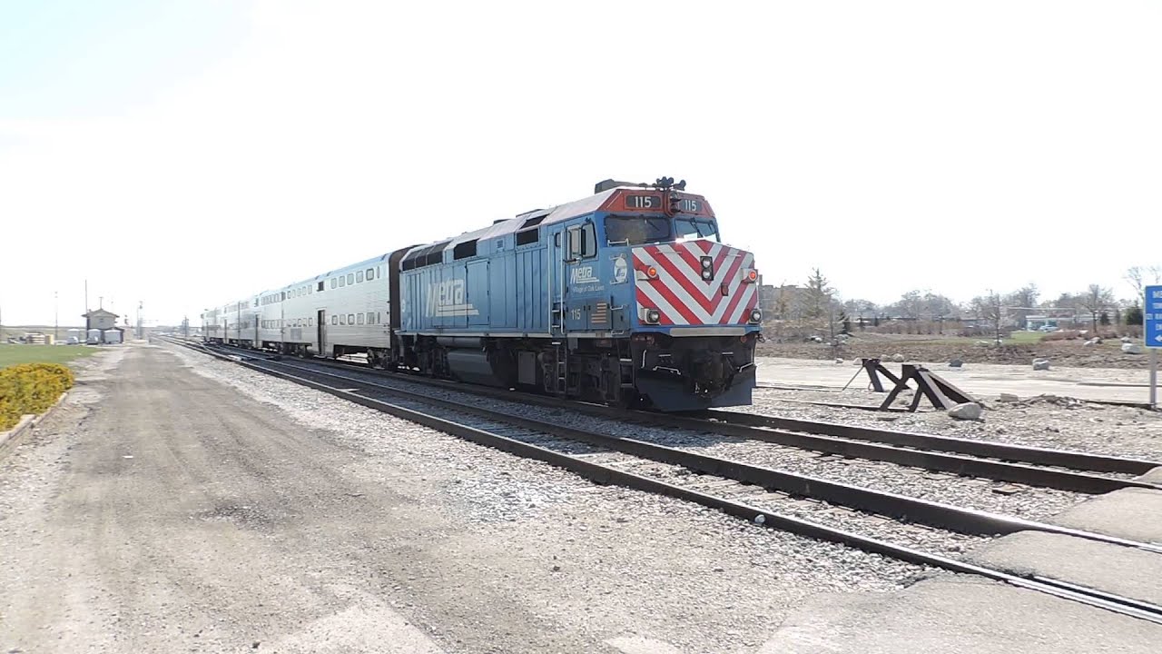 Metra engine 115 a F40PH-3 leads a inbound train in Bensenville IL ...