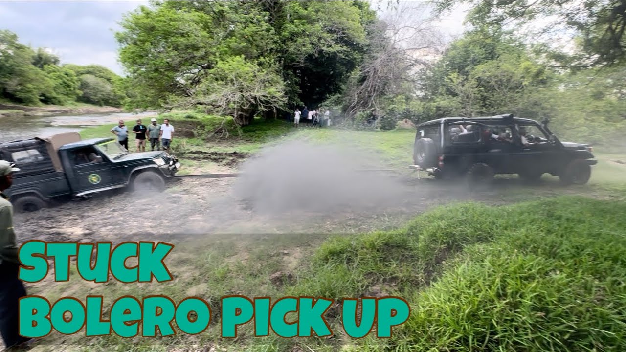 Stuck bolero recovering by Land Cruiser | Bolero fans - YouTube