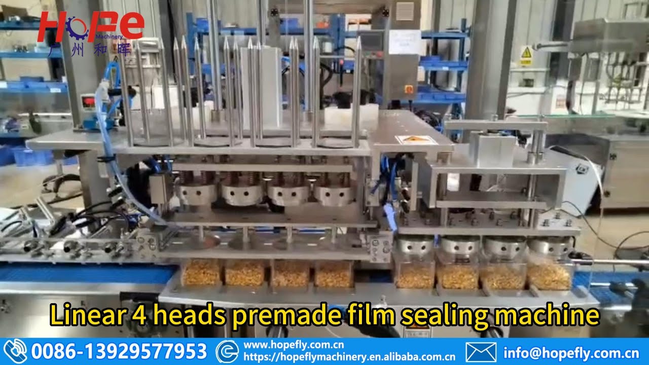 Linear 4 heads premade film sealing machine - YouTube