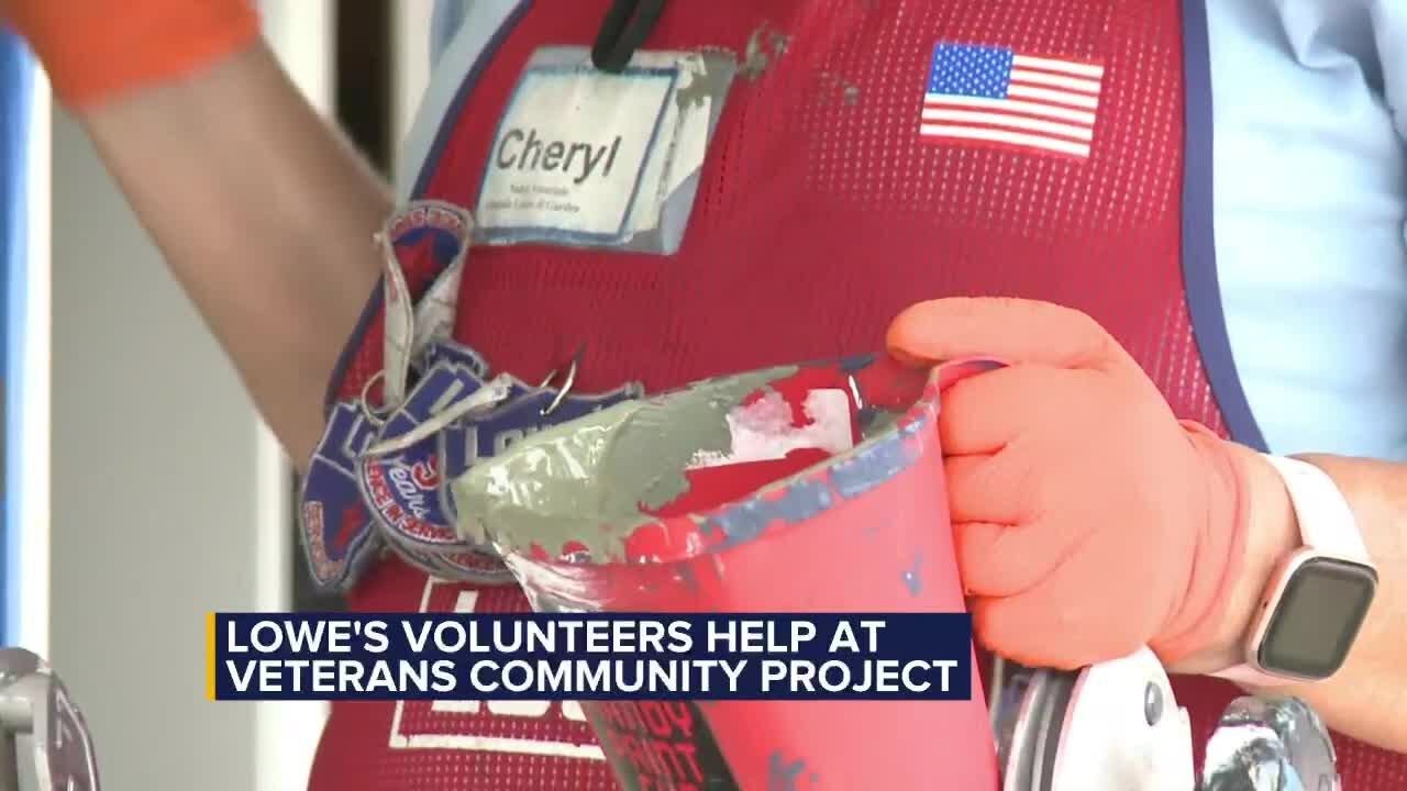 Lowe's volunteers assist Veteran's Community Project - YouTube
