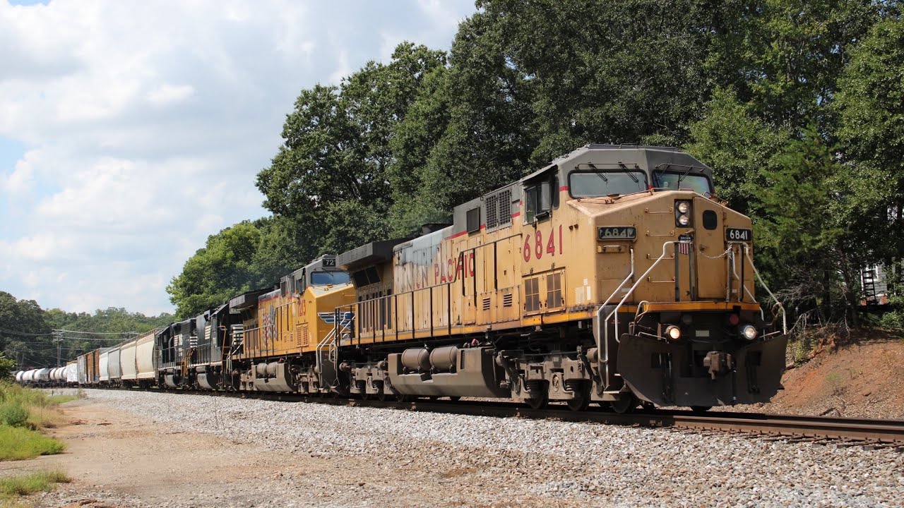 NS 154 with a UP AC44CW leader & NS P44 with a GP38-3 leader at Duncan ...