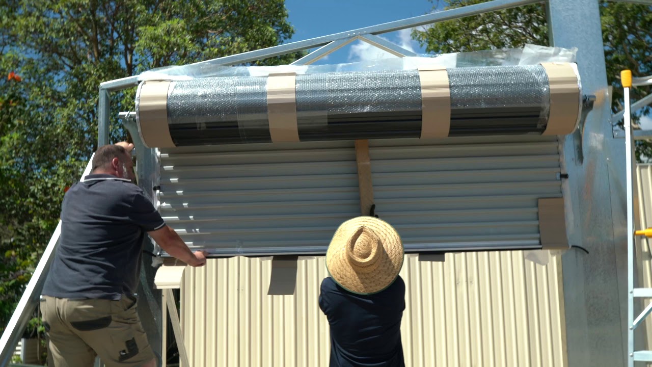 Installing a RG60602N2 Mullion kit for 2400mm Wide Roller Doors - YouTube