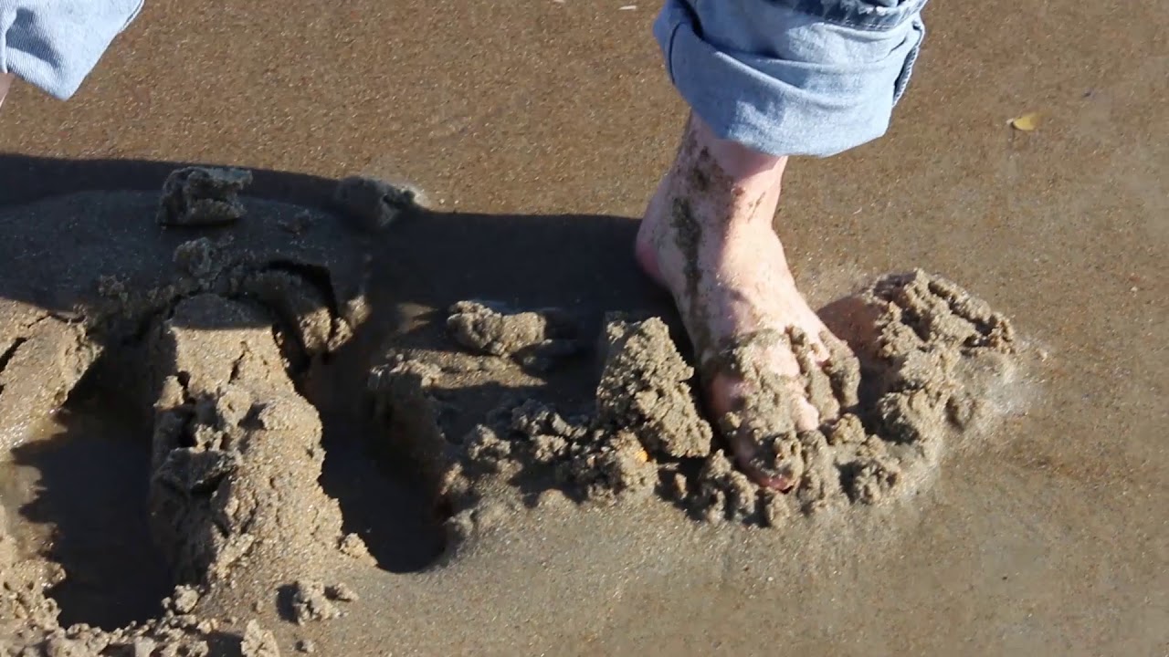 Feet Sinking Into Sand - YouTube