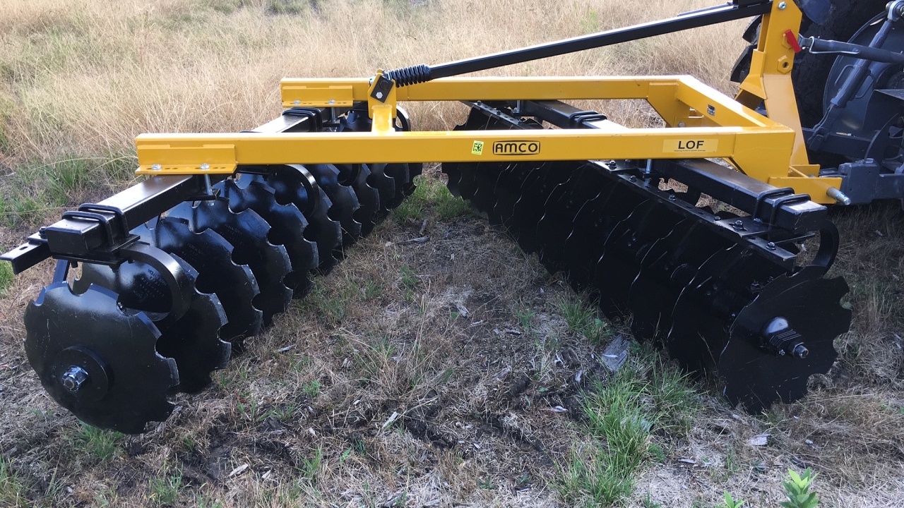 AMCO LOF Disc running in stump unbroken ground for food plots (1 of 4 ...