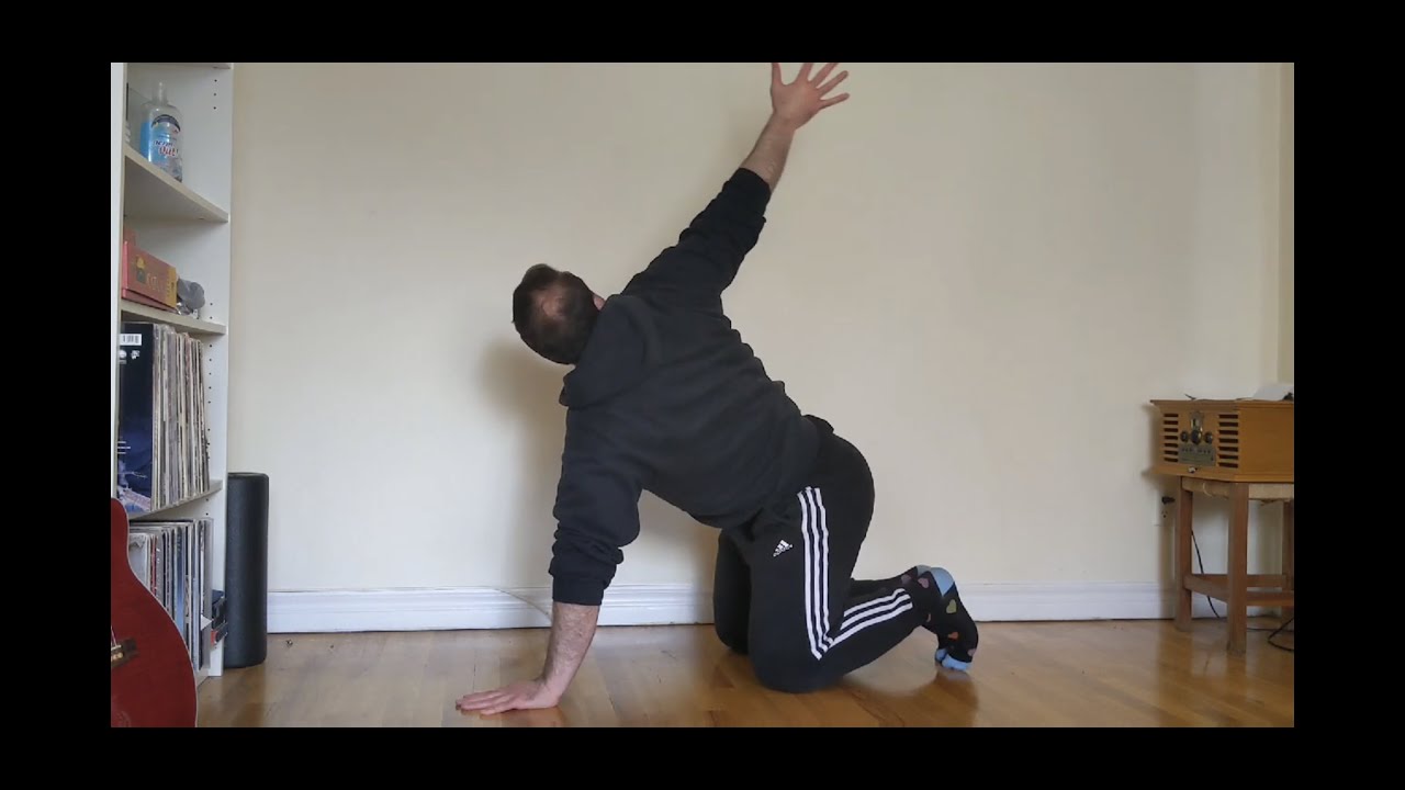 Quadruped Thoracic Rotation with Reach - YouTube