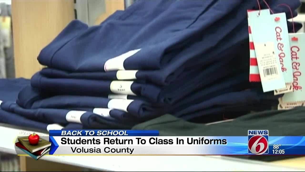 Students return to class in uniforms - YouTube