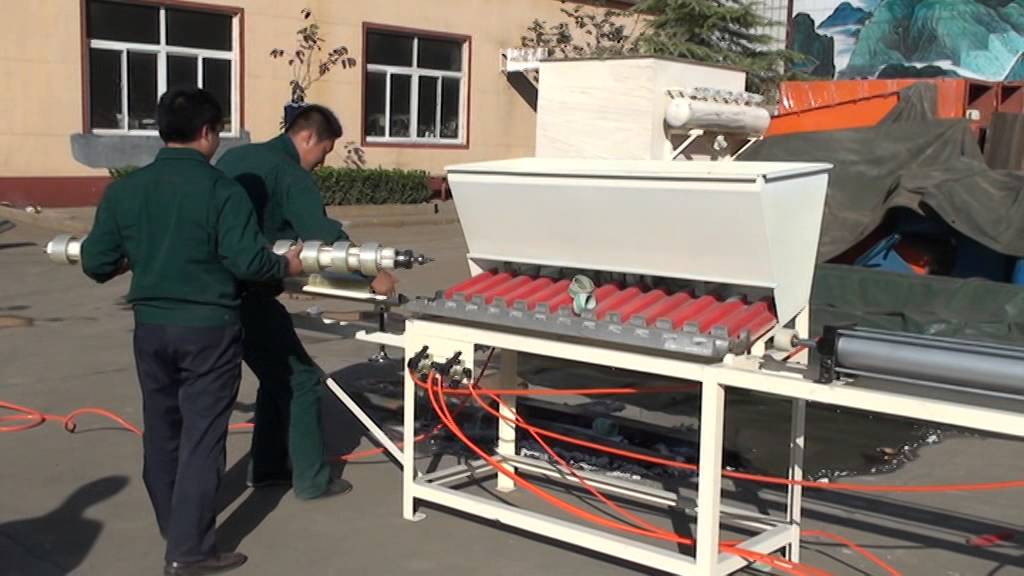 paper core loading and unloading machine - YouTube