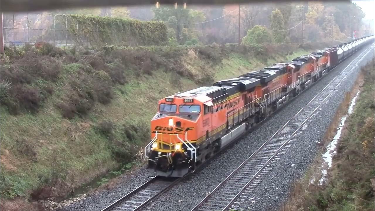 20181105 November 5 2018 In the rain CSX Q032 intermodal, 212 car 2 mile long CSX oil train BNSF ...