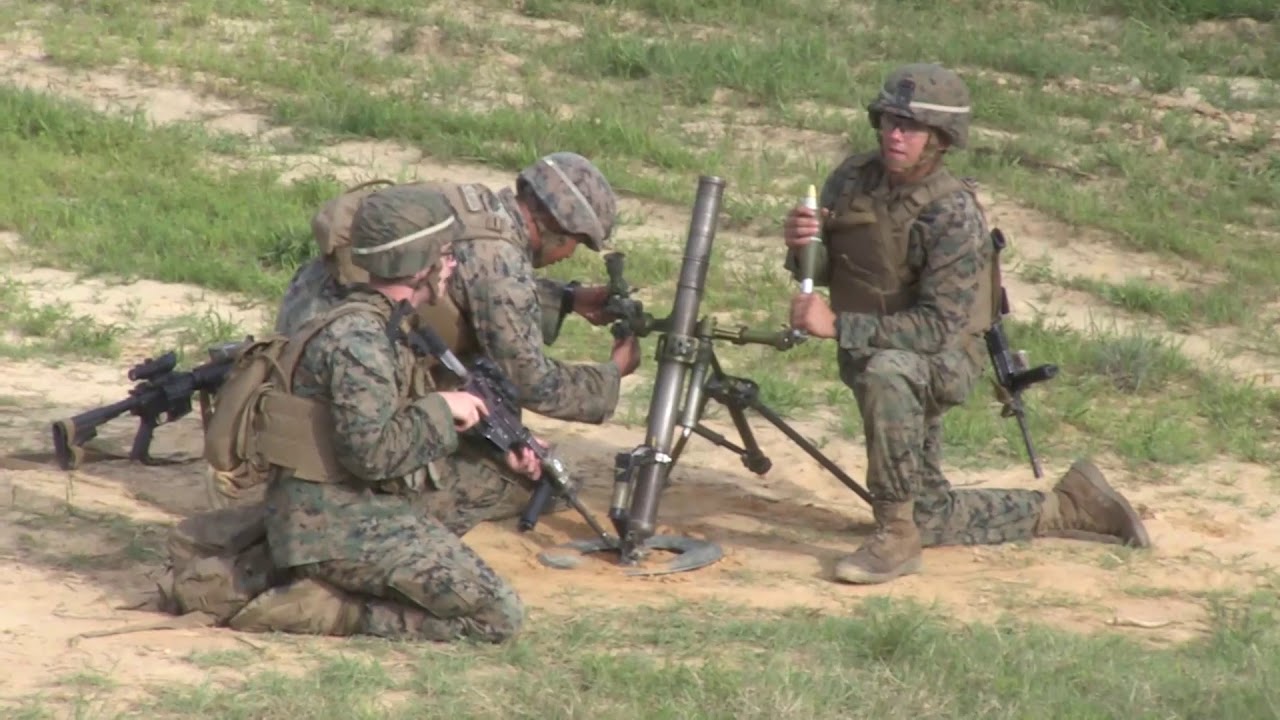 U.S. Marines fire 60mm mortar systems during a Deployment for Training ...