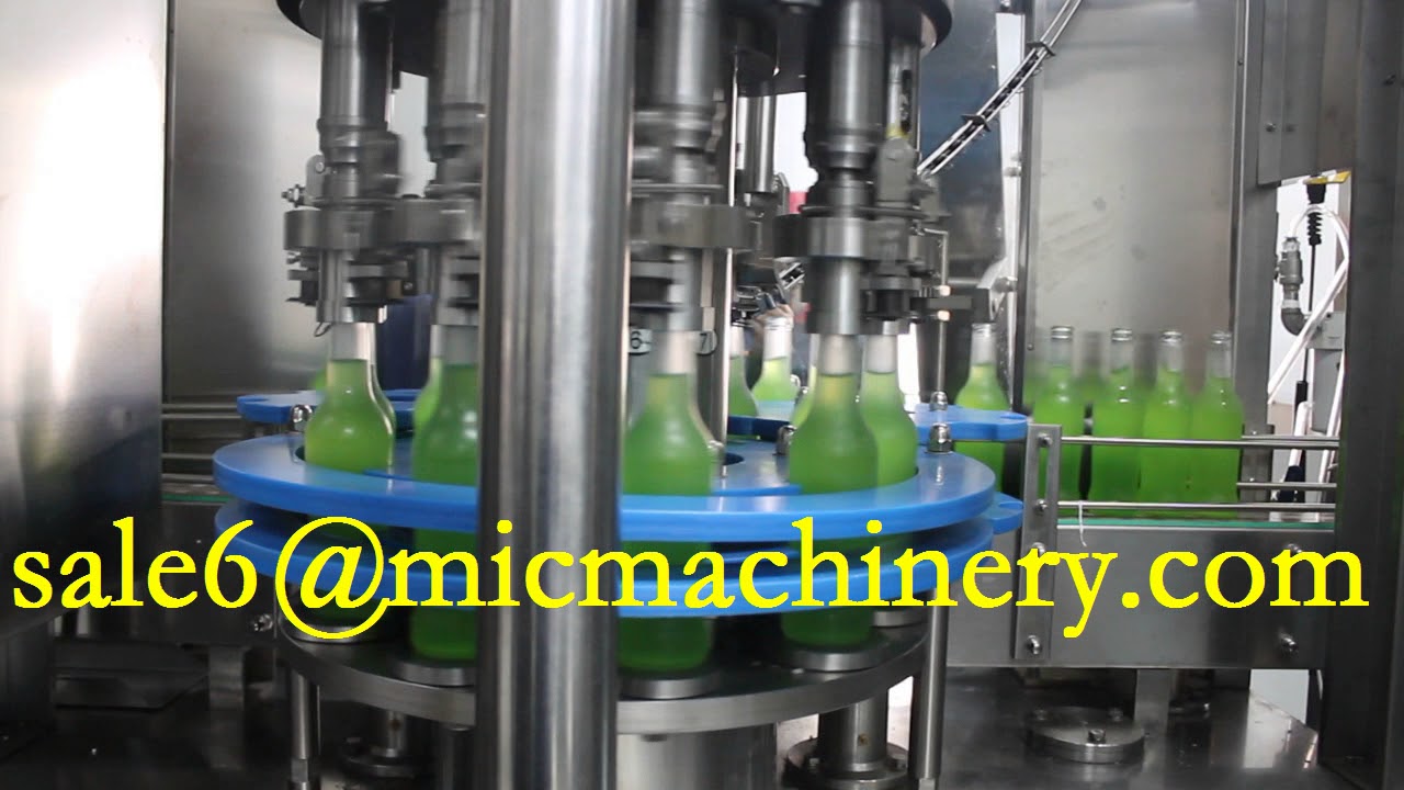 Glass bottle ring pull caps seaming machine - YouTube