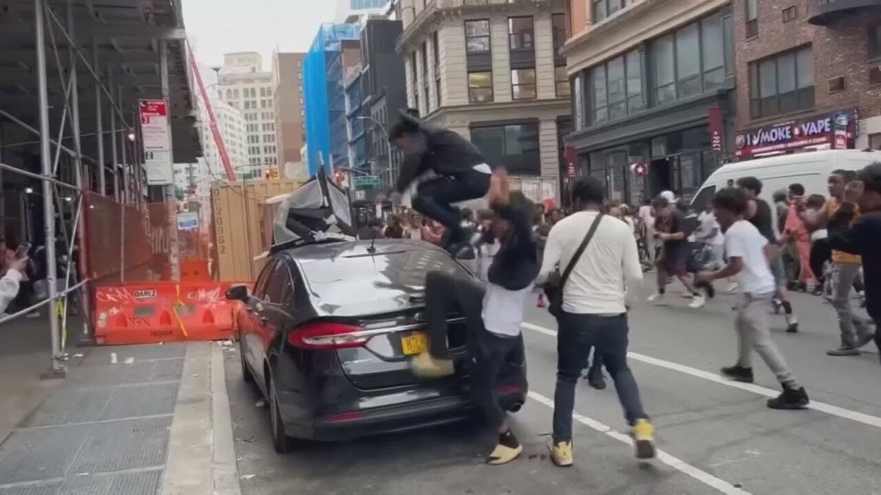 Social media influencer charged with inciting riot after thousands ...