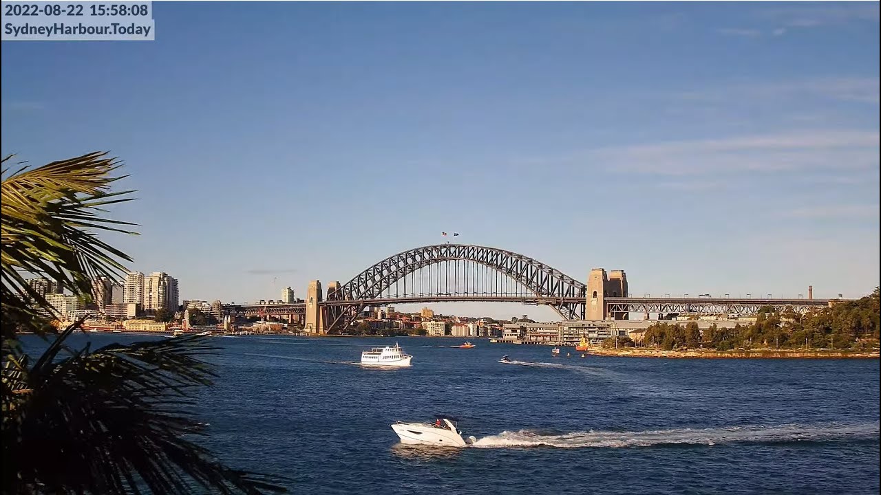 Clear windy evening on the beautiful harbour. Sydney Harbour Bridge ...