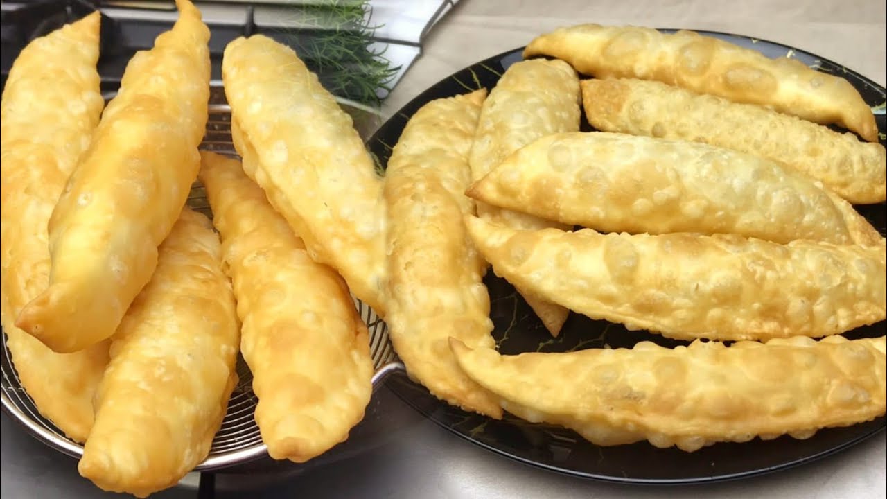নারিকেল এর পুলি পিঠা রেসিপি। Narikel er Puli Pitha Recipe - YouTube