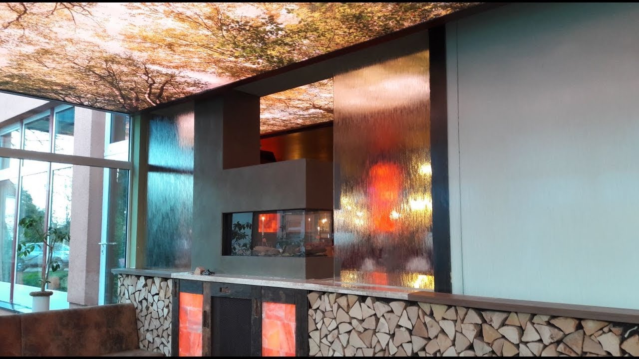 Indoor Waterfall Wall Design with Fireplace In Luxury Hotel - YouTube