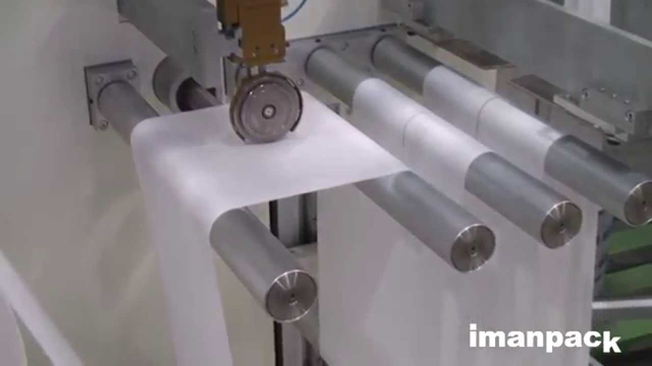 Converpack - single wet nap converting and packaging - double fold ...