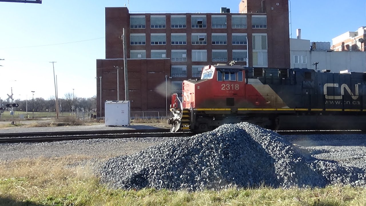 CN 2318 & CN 8826 Hauling A Eastbound Freight Train With A DPU CN 2810 ...