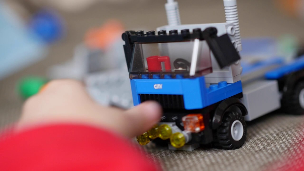 Kid building Lego City model. Free HD video footage - YouTube