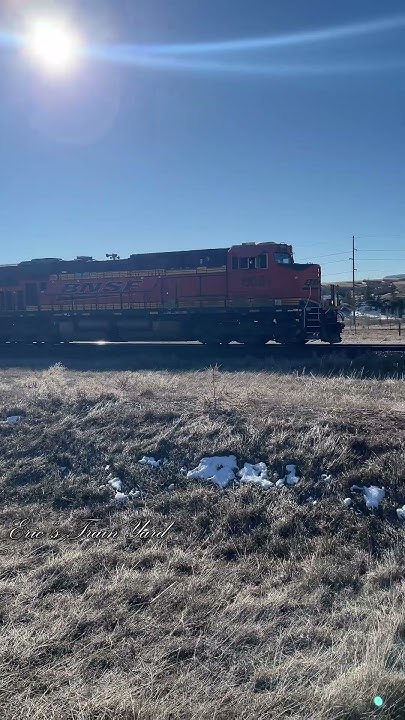 Friendly BNSF Engineer give us a horn salute as he passes me and my boys. - YouTube