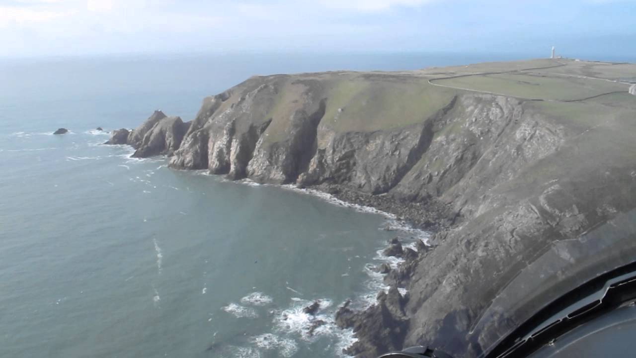 Helicopter approach to The Island... - YouTube