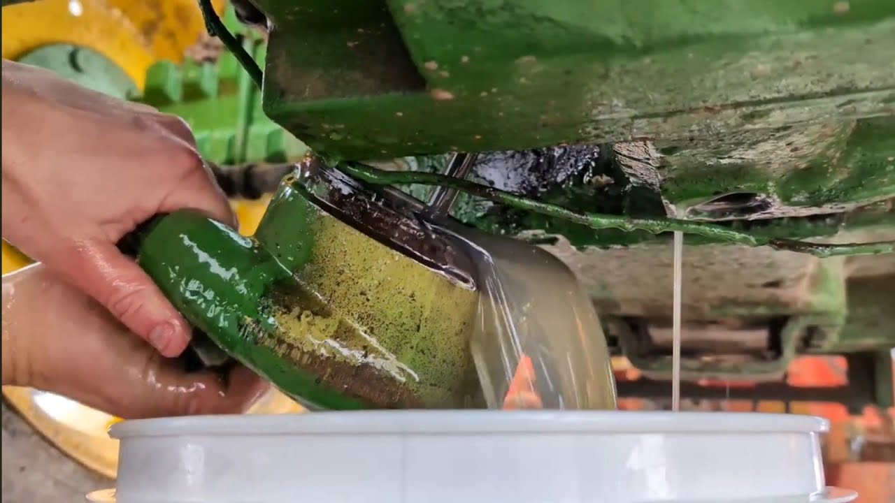 changing hydraulic oil john deere 2130 (part 2) - YouTube