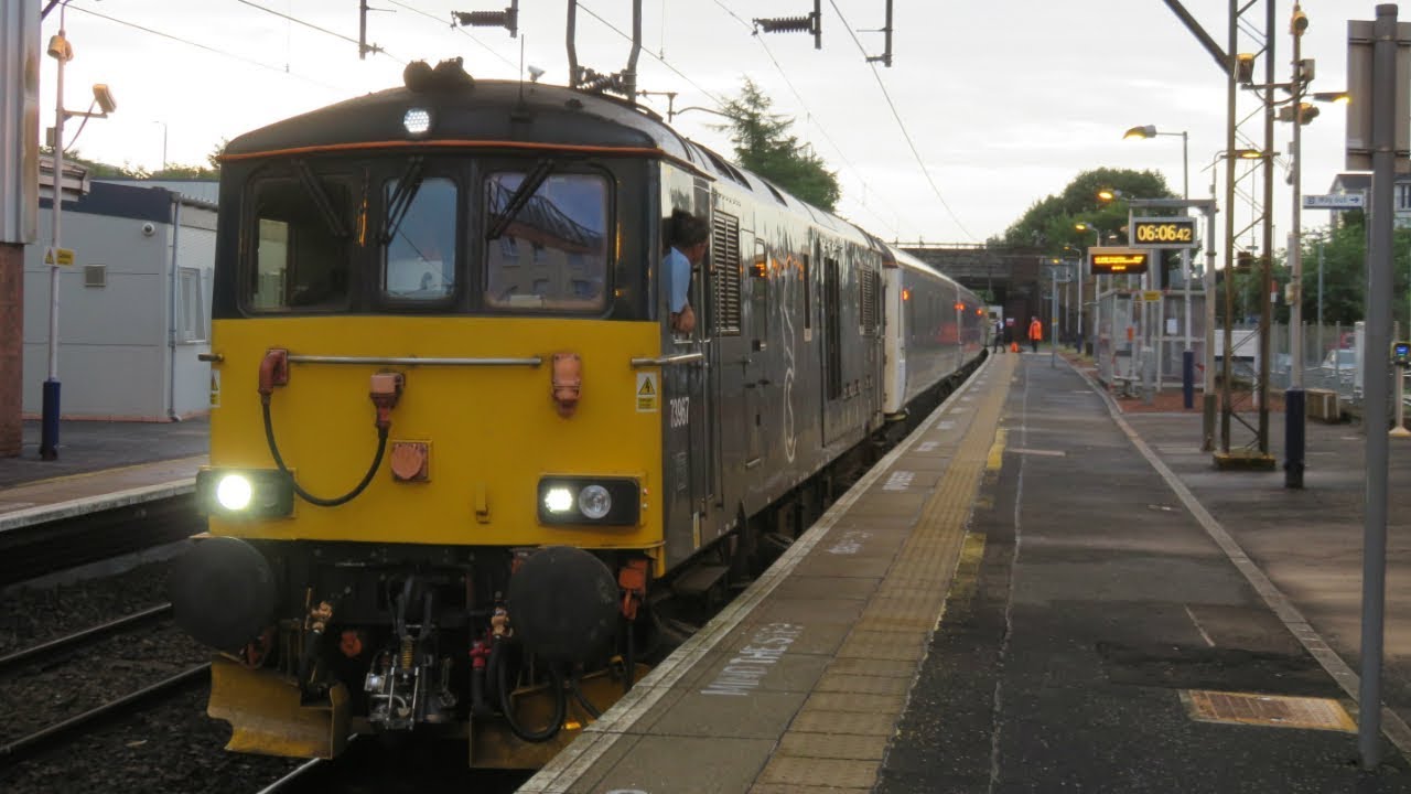 UK: The Caledonian Sleeper leaves Dalmuir station hauled by Class 73 ...