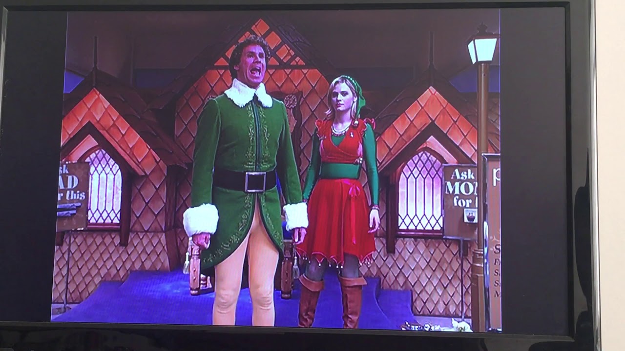 Elf Buddy sings in the store - YouTube