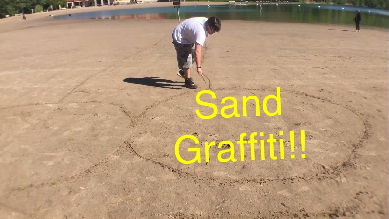 Sand graffiti! - YouTube