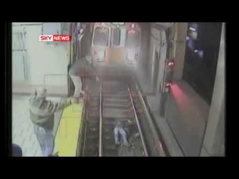 DRUNK WOMAN SURVIVES FALL UNDER TRAIN - YouTube