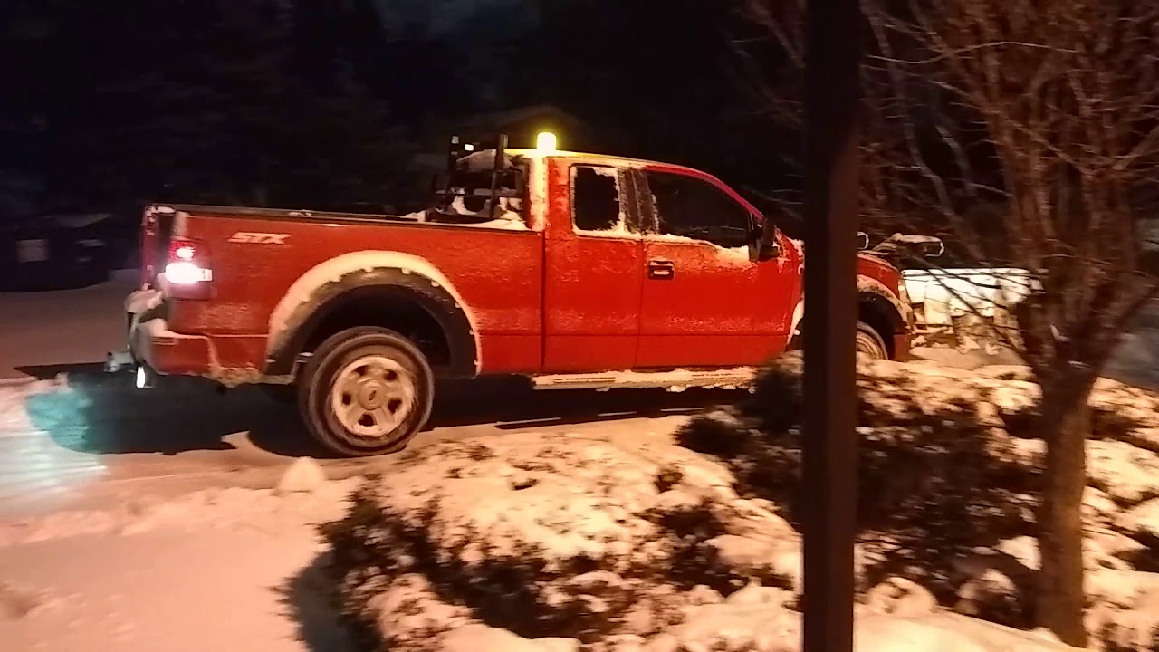 2005 Ford f150 stx with Fisher SD plow a foot of snow - YouTube