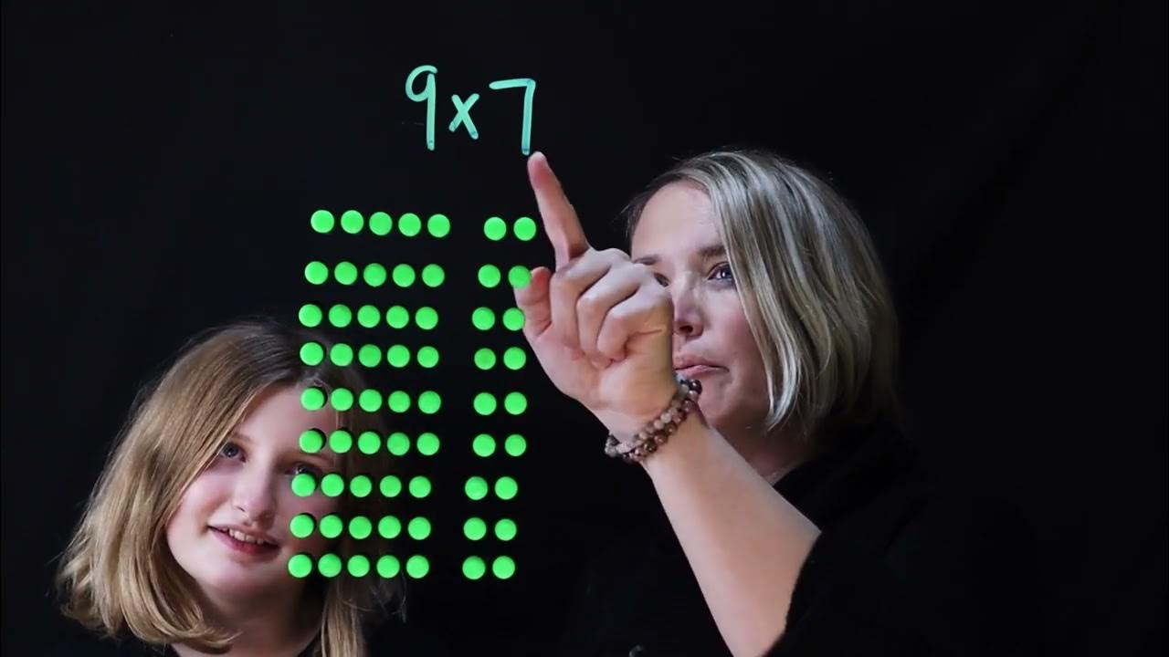 9 is a magic number! Multiplying 9x7 - YouTube