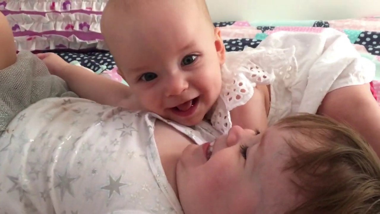Baby Addy and Penny sister play and slobbery kisses - YouTube