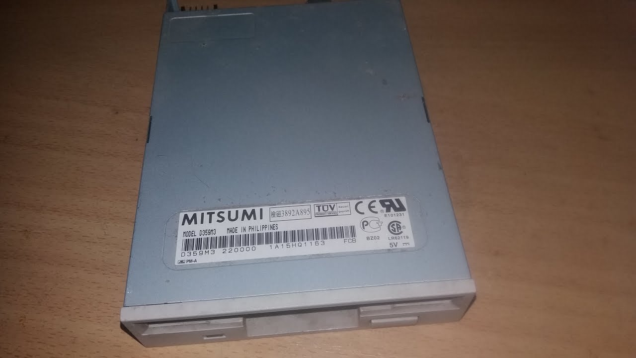 Розбір філіпінського приладу для зчитування гнучких дисків Mitsumi ...