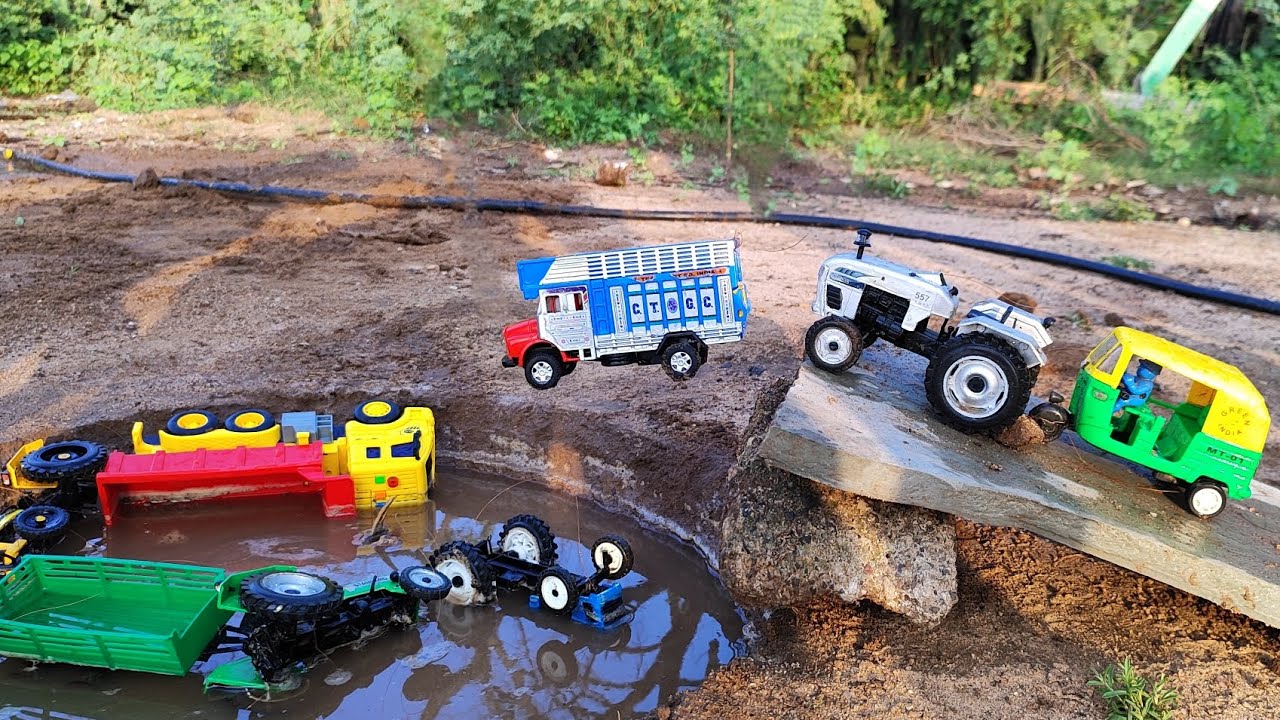 jum river, tata truck, iser tractor, auto rickshaw, jcb, dumper truck ...