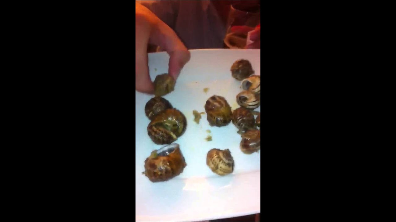 Man eats whole snail - YouTube