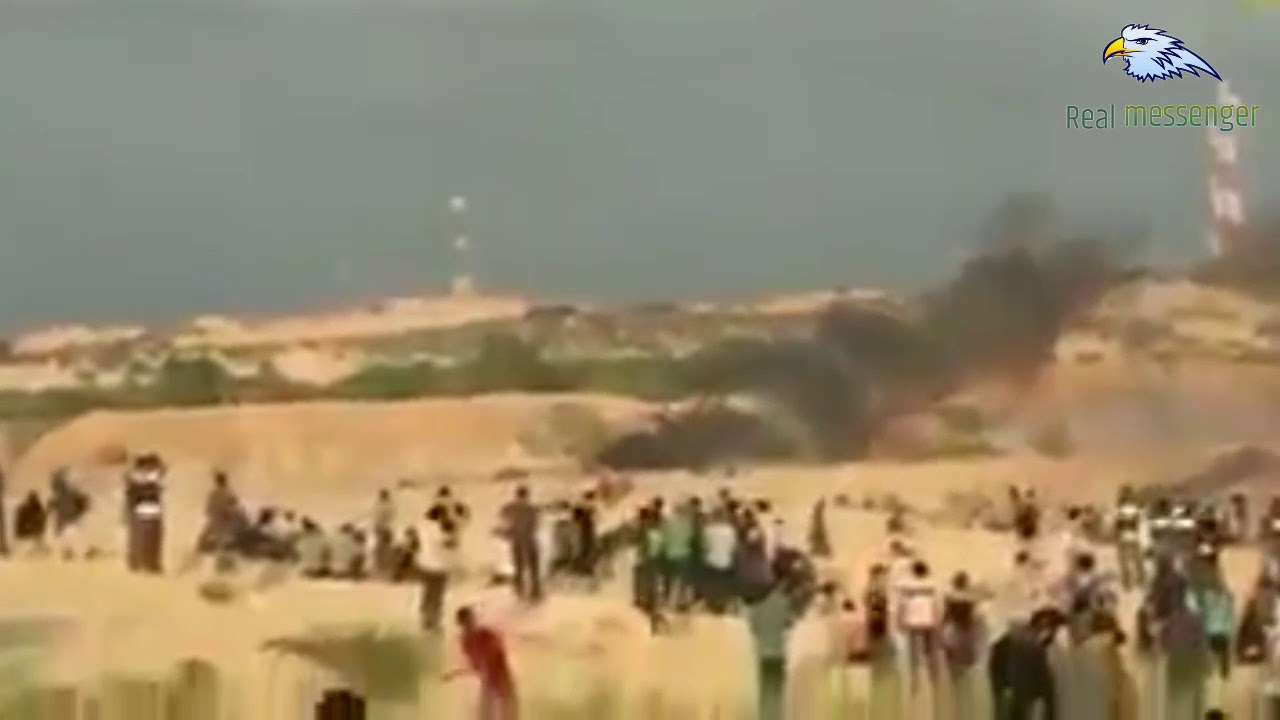 Close up view of the moment an IED detonates in front of Palestinians ...