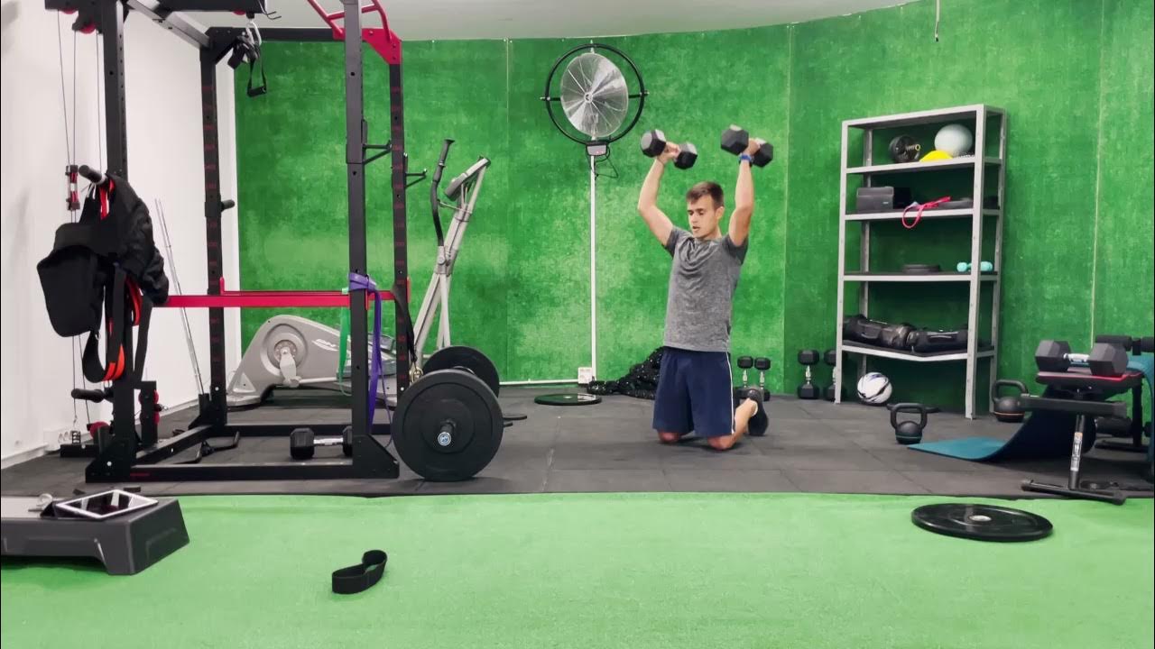 Empuje vertical con mancuernas (arrodillado) - YouTube