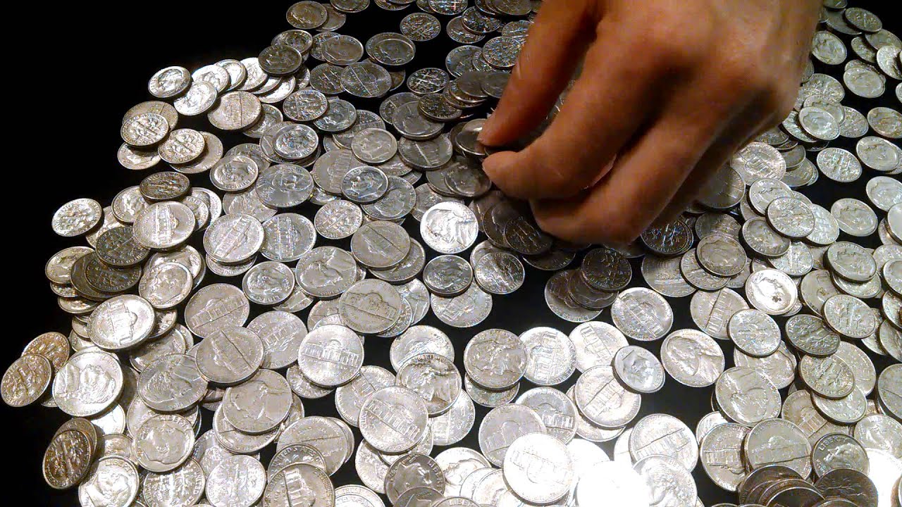 7 years of pocket change saved - YouTube