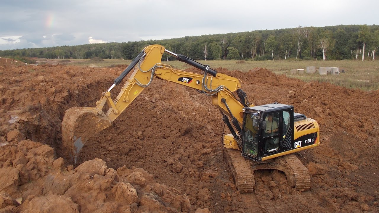 Cat 319D LN - YouTube