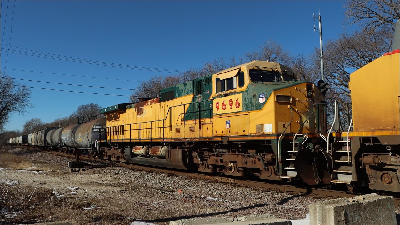 UP 8346 Leads MALPR with UP 9696 former CNW 8632 dead in tow at St ...
