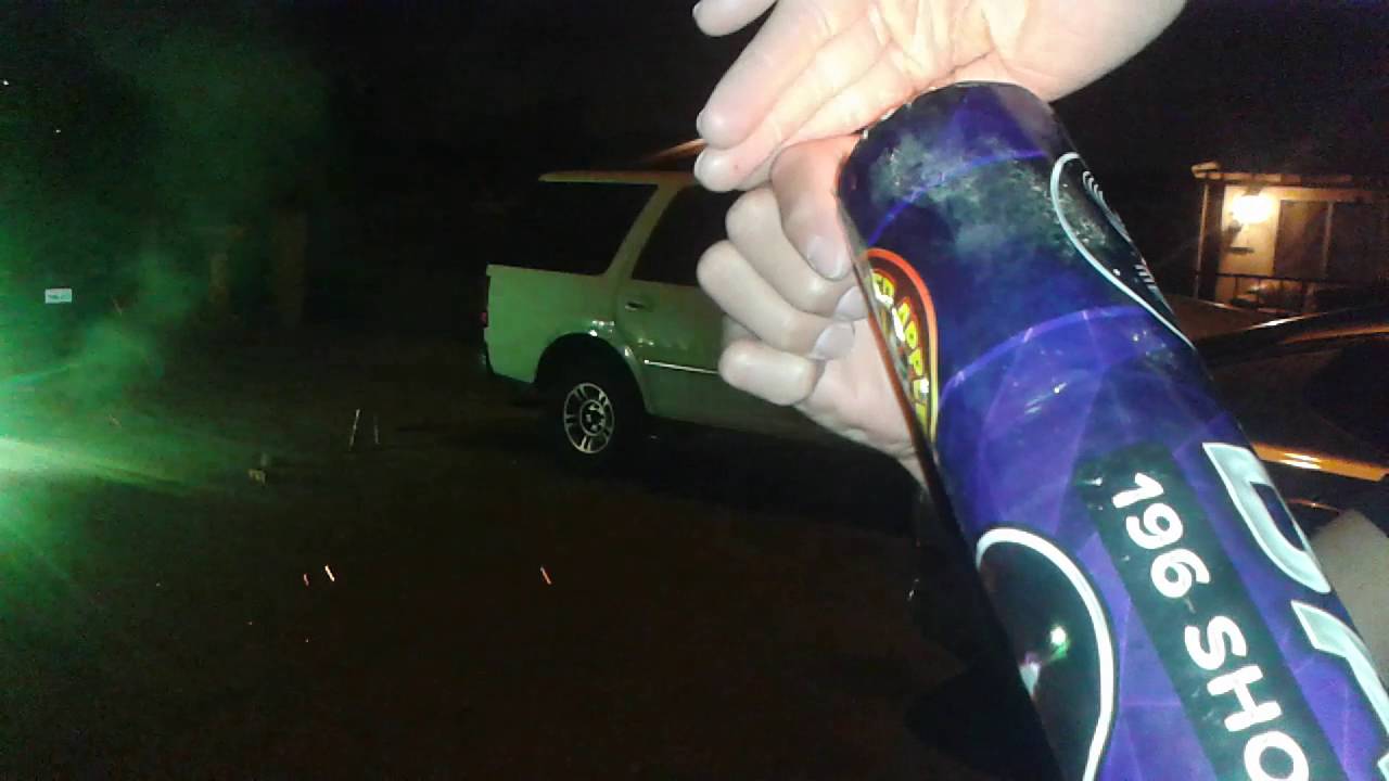 196 shot uv roman candle barrage red apple firewroks - YouTube