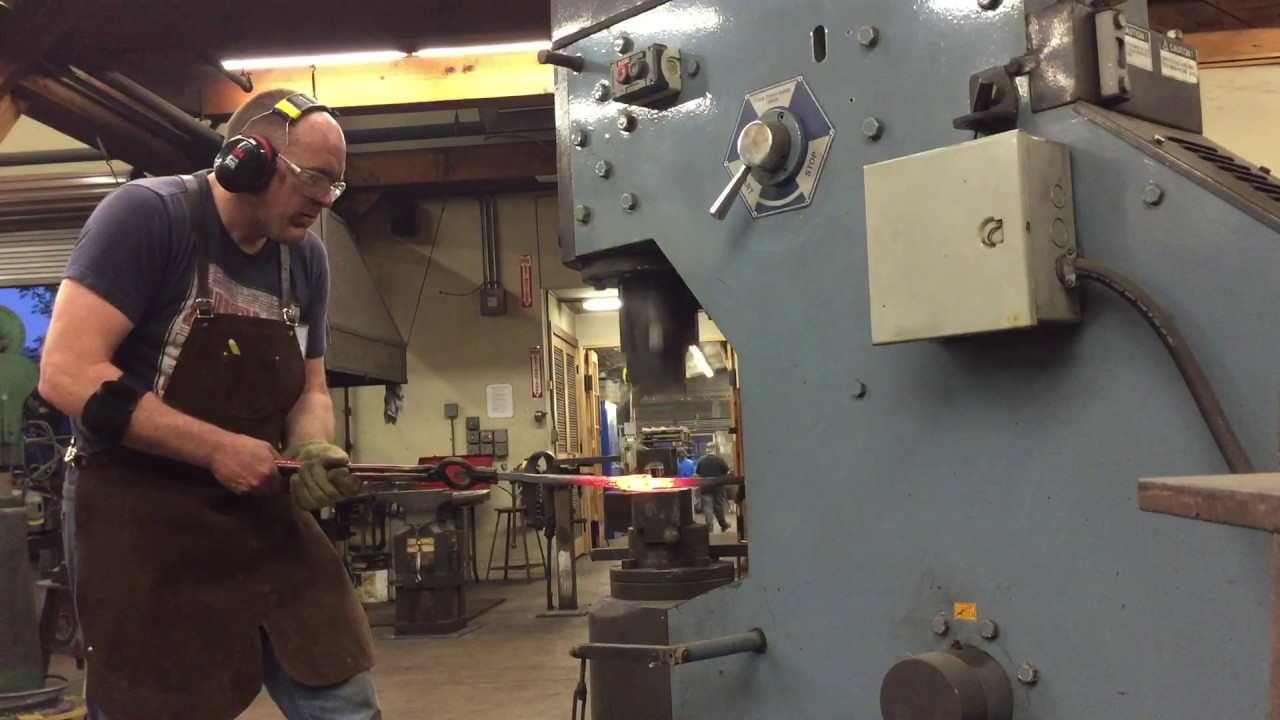 Forging railroad tie plates on power hammer - YouTube