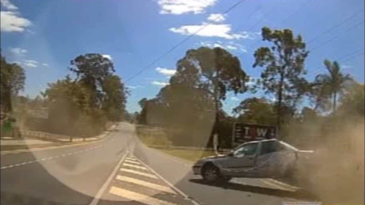 Terrifying video shows speeding car on wrong side of road before ...