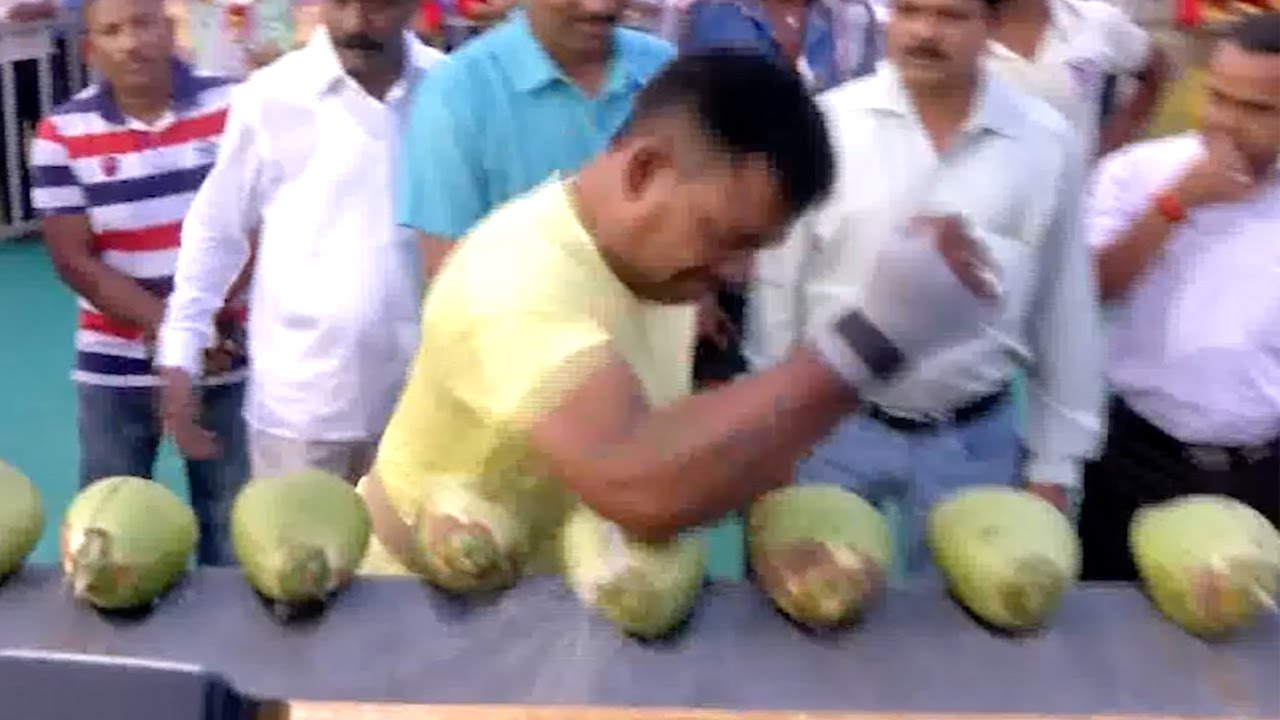 World Record For Coconut Smashing With Elbow - YouTube