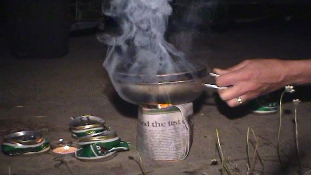 Cooking on a newspaper stove - YouTube