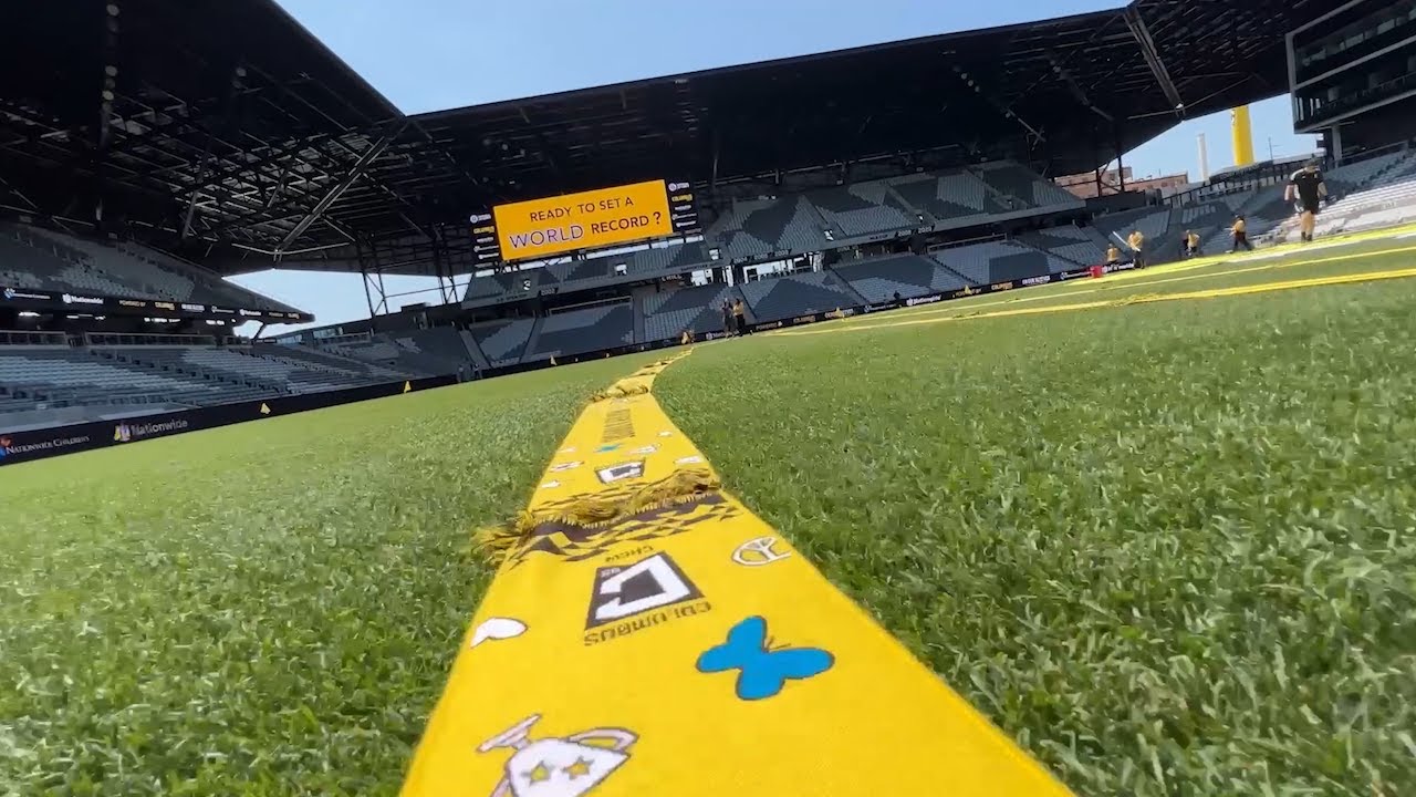 Guinness World Record | Longest Chain of Sports Fan Scarfs - YouTube